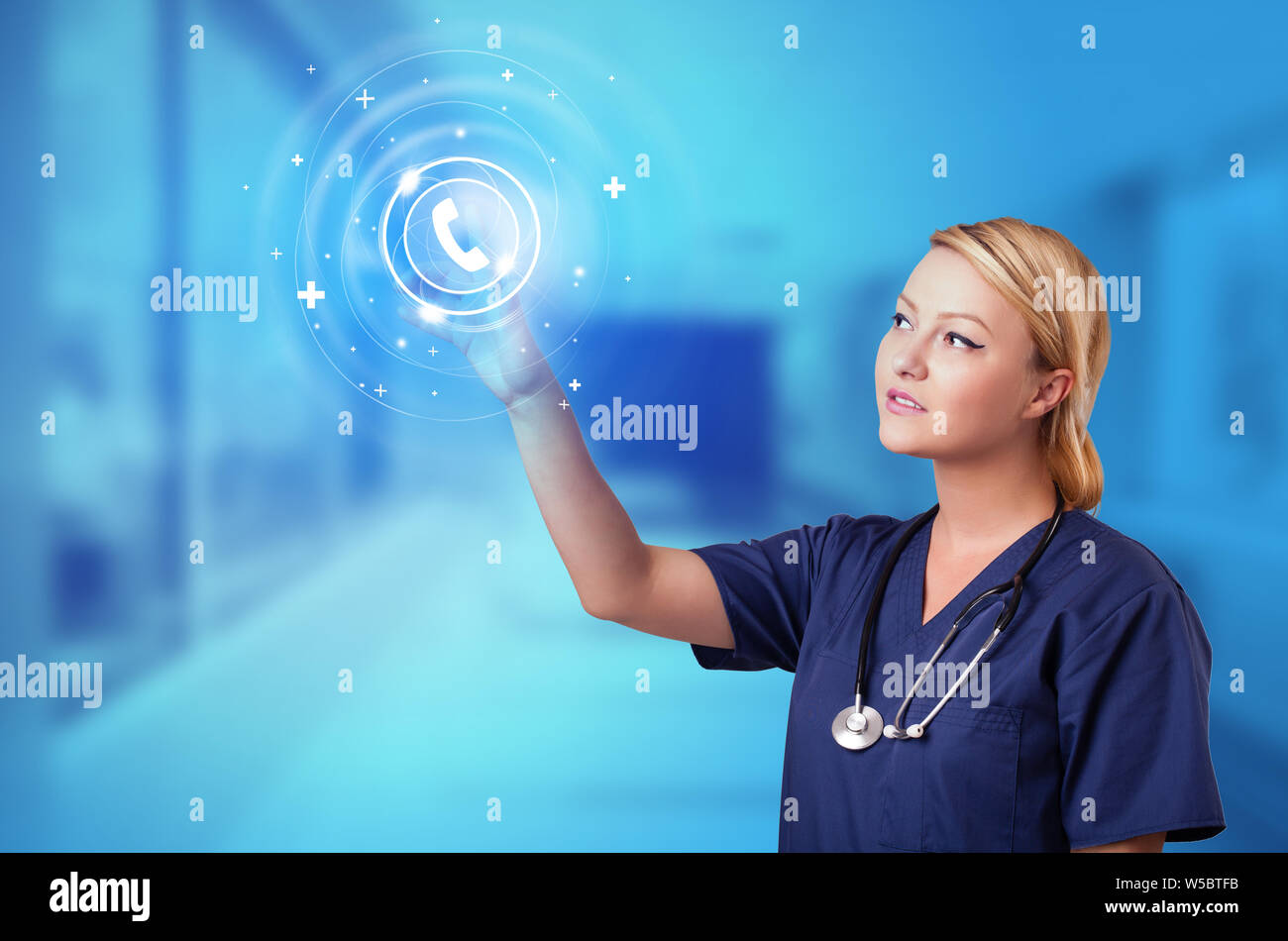 Doctor touching blue screen with call center concept Stock Photo - Alamy