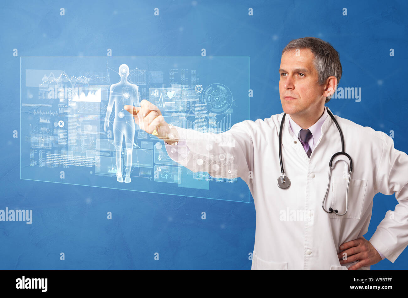 Doctor touching blue screen with full body analyze concept Stock Photo ...