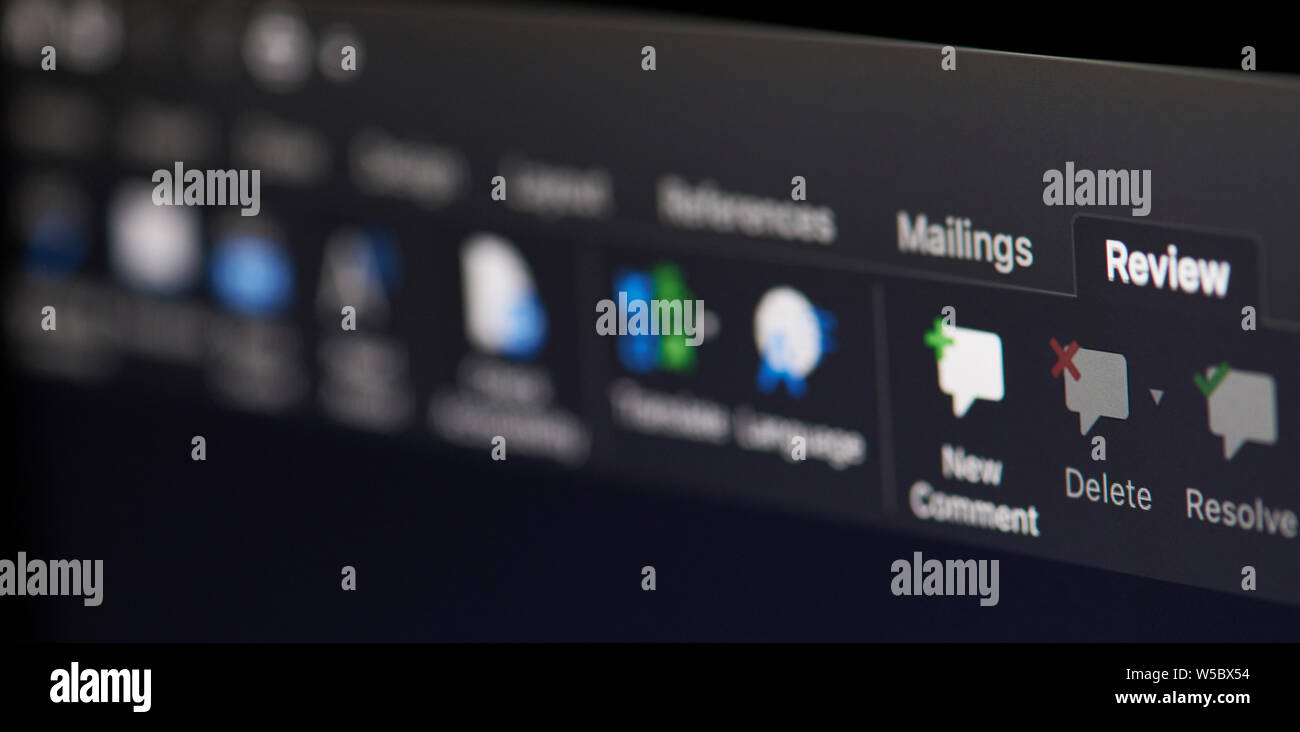 New york, USA - july 26, 2019: Adding review in microsoft office word ...