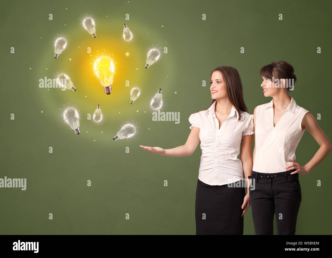 Young smiling person presenting new idea concept Stock Photo - Alamy