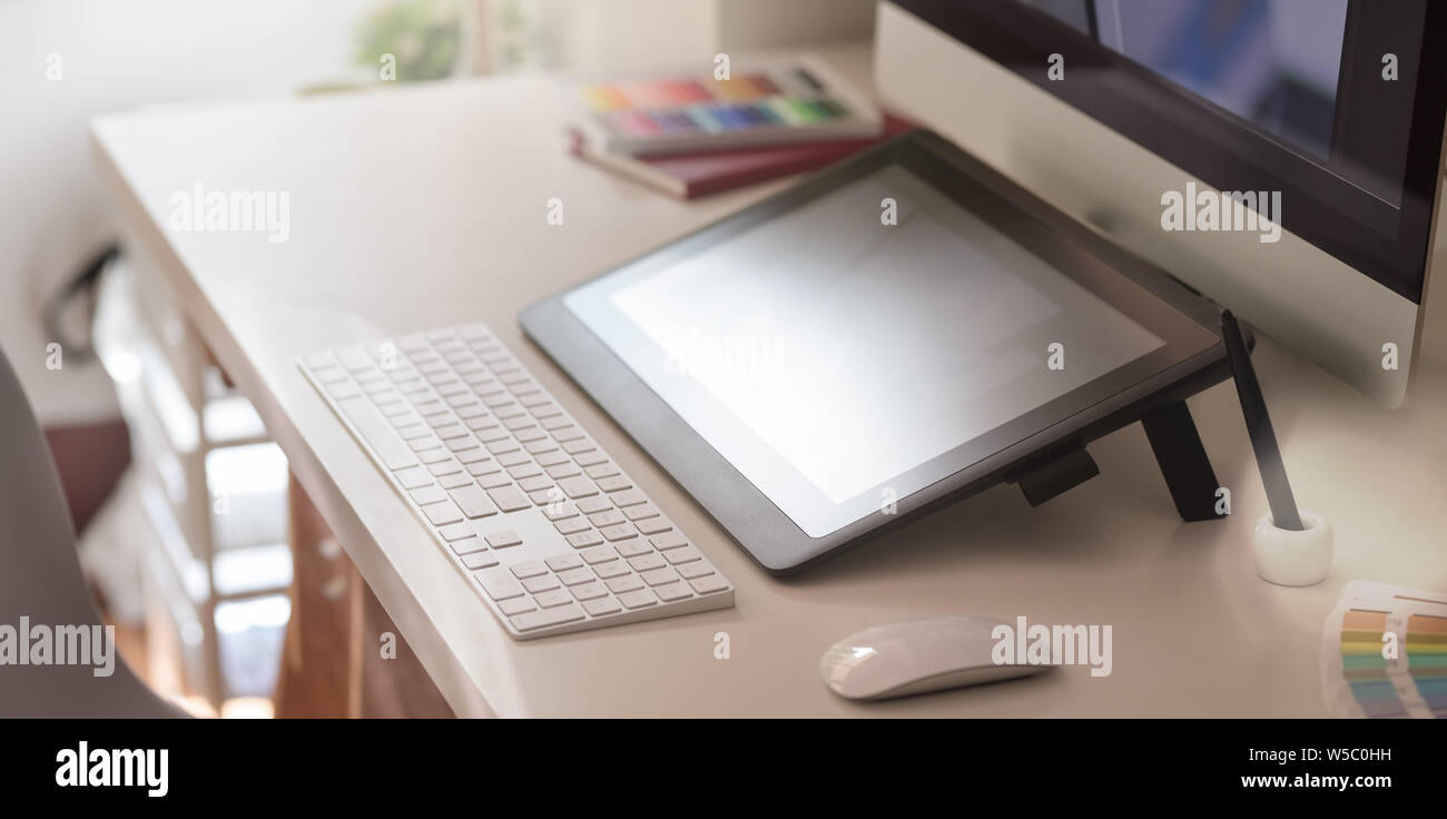 Graphic designer workspace with drawing tablet screen Stock Photo - Alamy