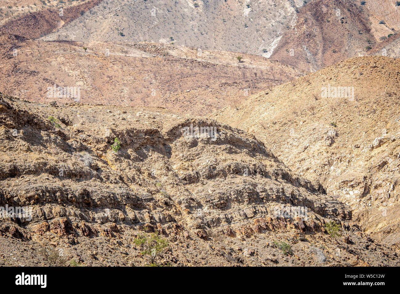 The rugged mountain sides of the Danakil Depression , Ethiopia Stock ...