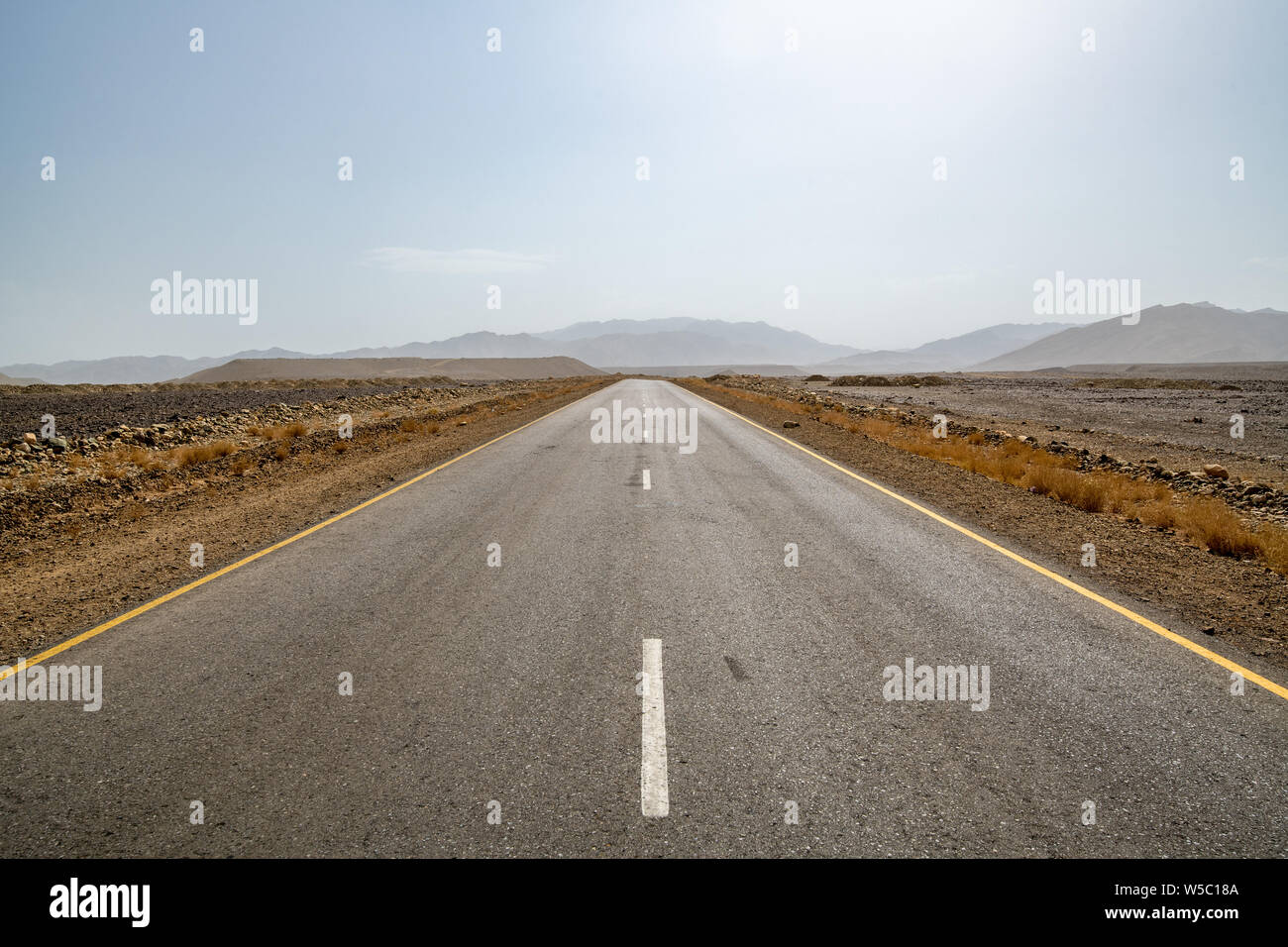 A road disappearing straight into the distance in Danakil Depression ...