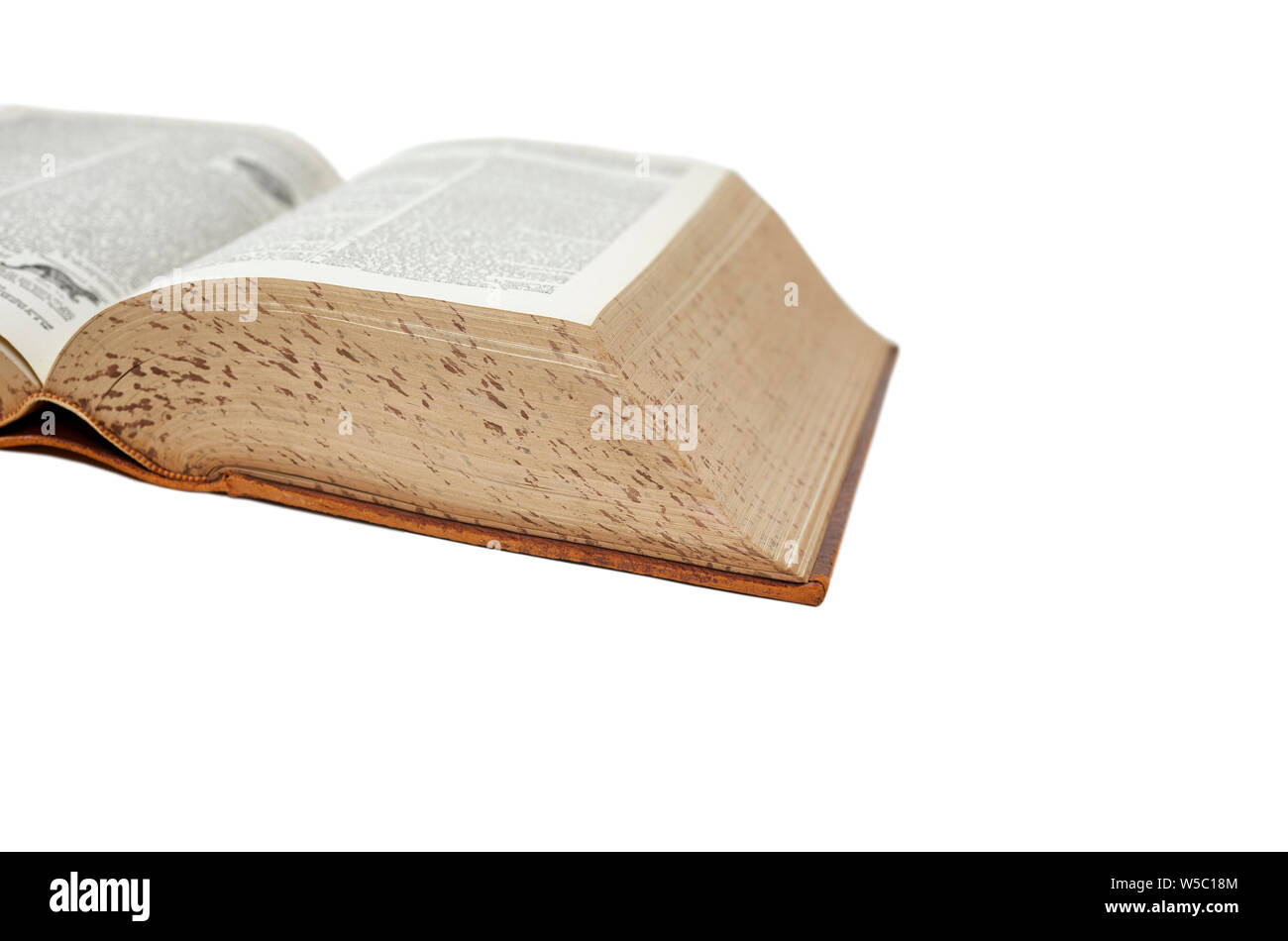 Large vintage dictionary covered in leather laying open isolated on ...