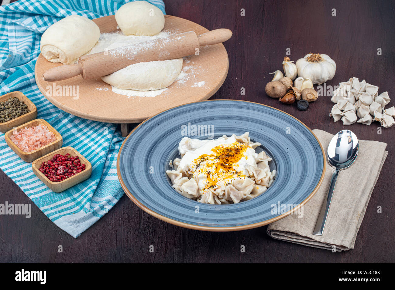 homemade delicious turkish manti ( turkish ravioli ) with yogurt and ...