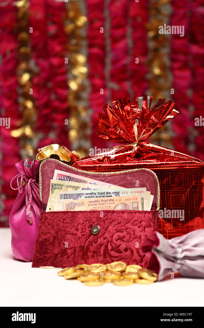 Gift with Indian banknotes Stock Photo - Alamy
