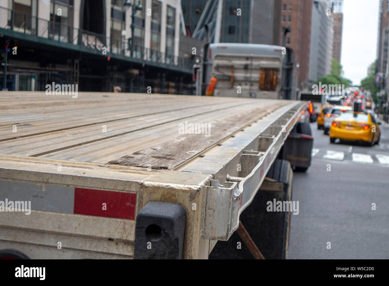 empty long flatbed truck commerical auto on a major new york city ...