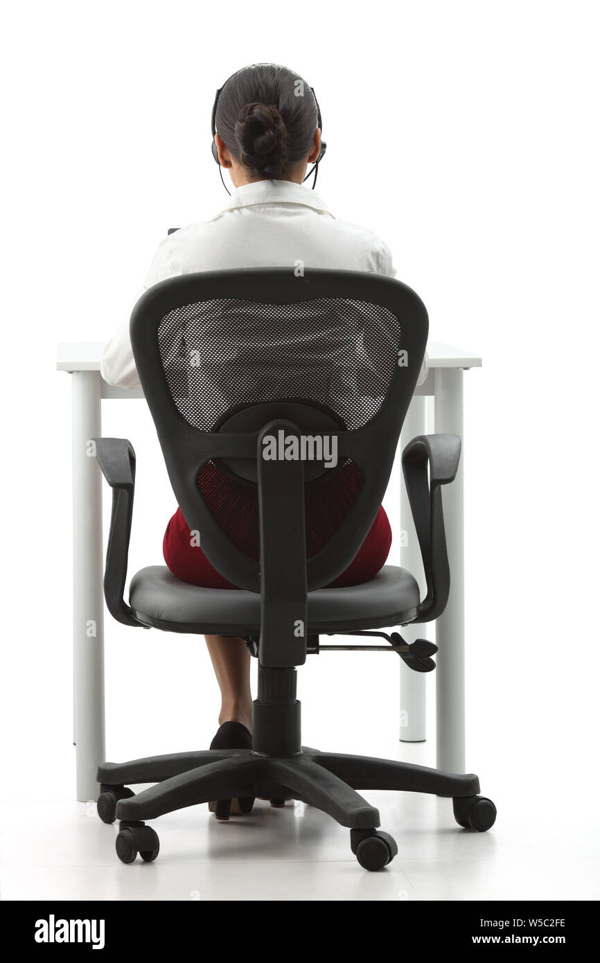 Girl sitting on chair, rear hi-res stock photography and images - Alamy