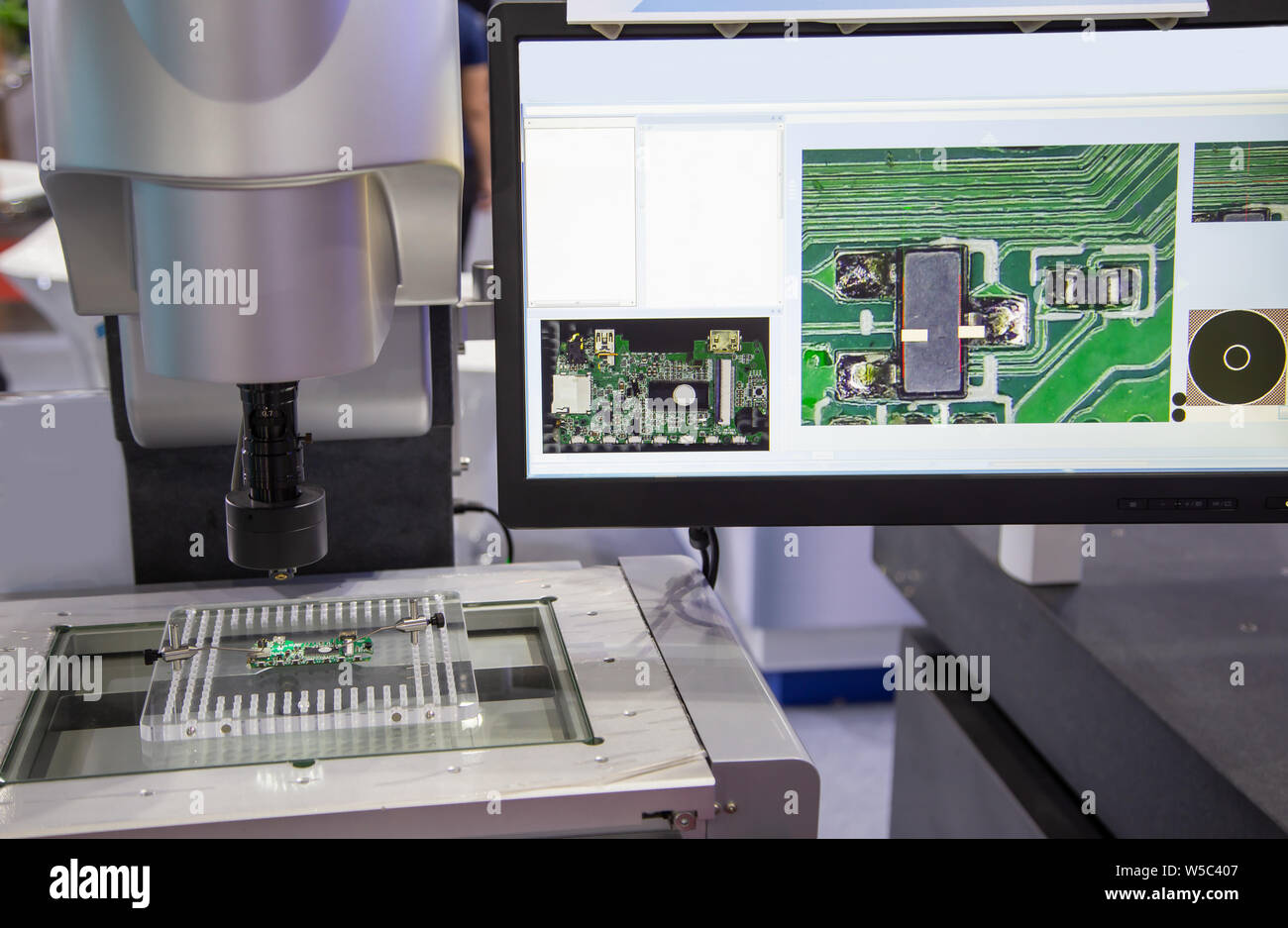 Vision measuring instrument inspecting PCB circuit board Stock Photo ...