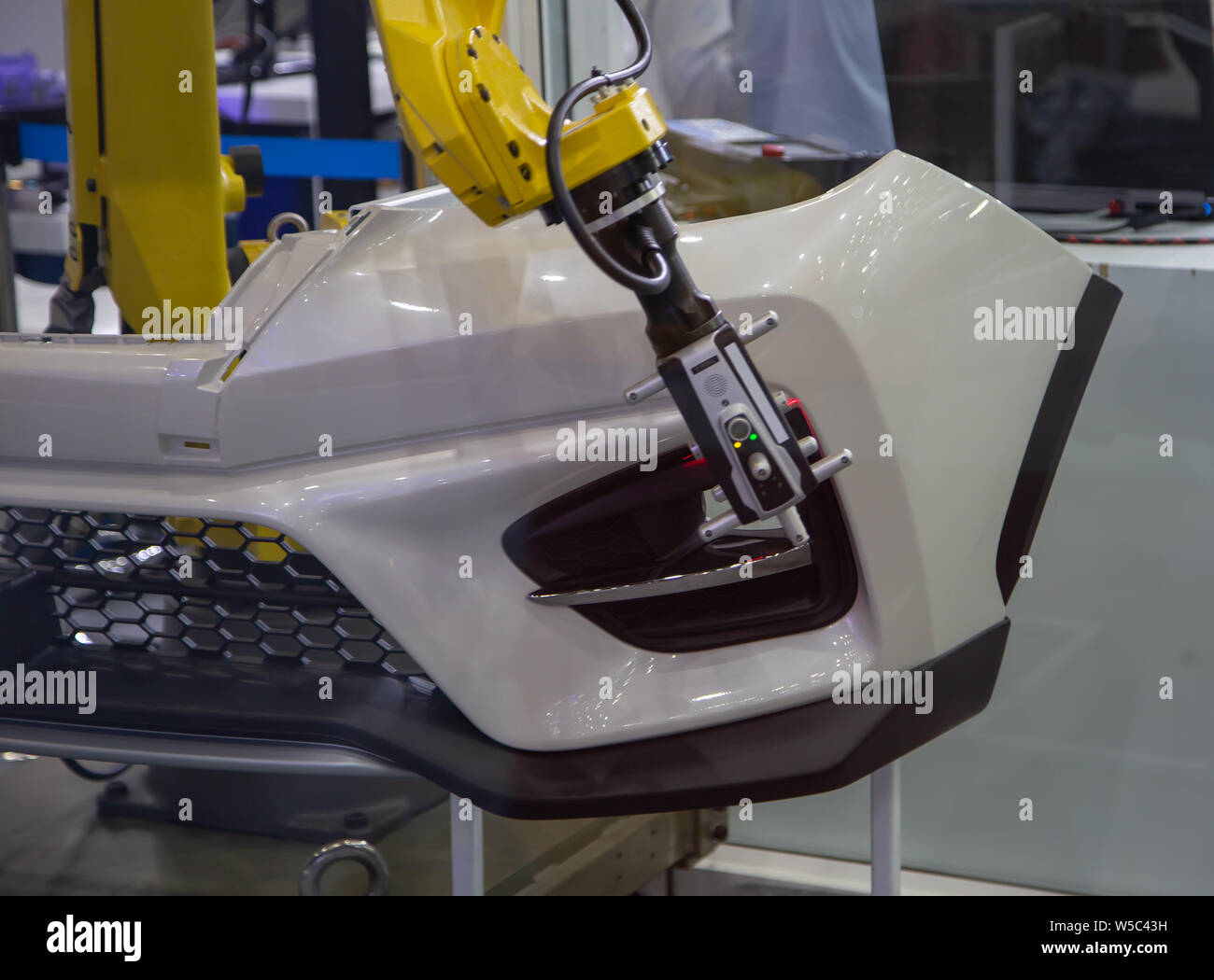 Automated robotic arm CMM scanning in automotive industry Stock Photo ...
