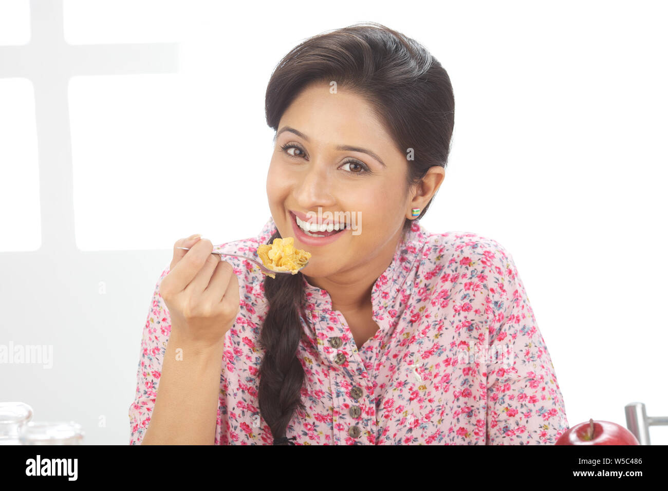 Girl Eating Cornflakes High Resolution Stock Photography and Images - Alamy