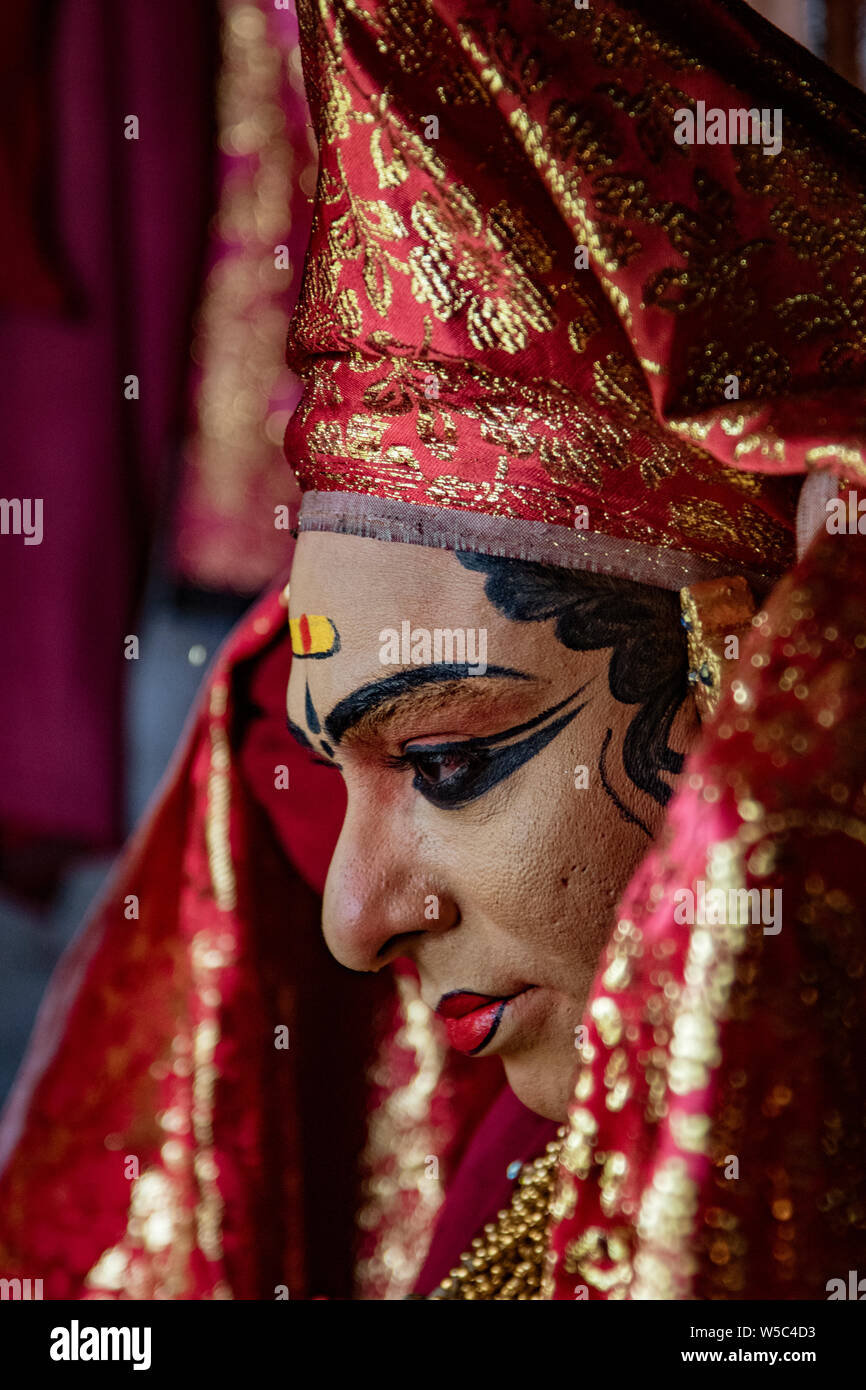 Munnar, India, Mar 11, 2018 - Traditional Indian dancer adjusts his ...