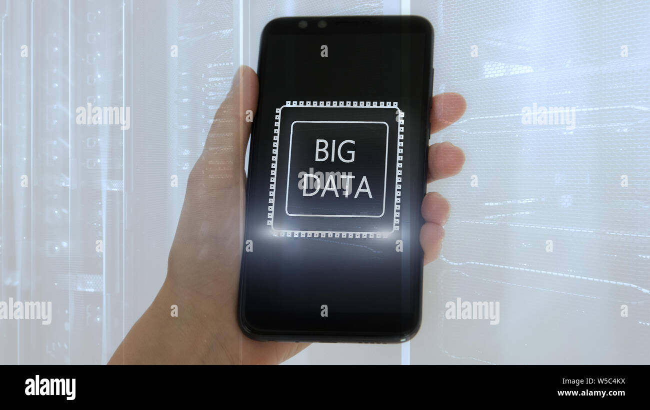 Woman Hand holding mobile phone. Server room background. Inscription on ...