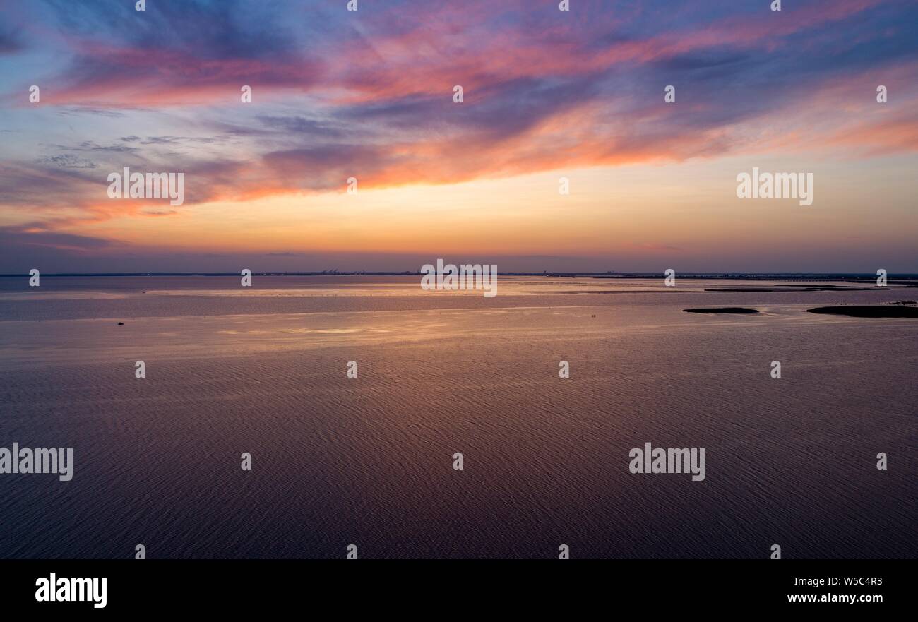 Mobile Bay at sunset Stock Photo - Alamy