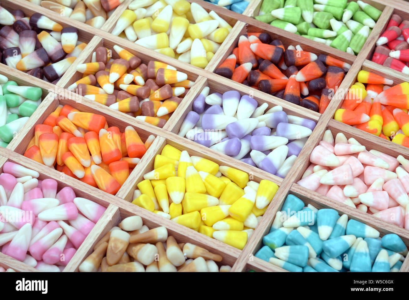 colorful candy corn box display at market place Stock Photo - Alamy