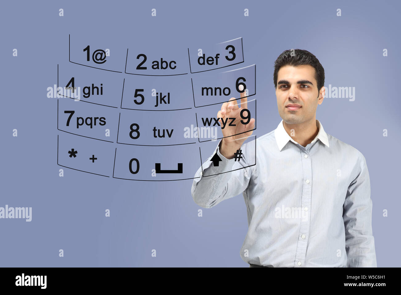 Businessman touching keypad of a mobile phone Stock Photo - Alamy