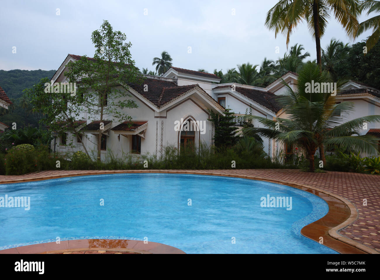 Swimming pool in a tourist resort Stock Photo - Alamy