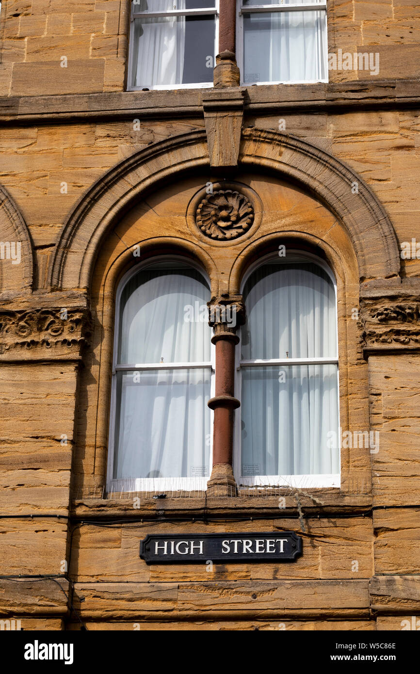 High Street road name on historic building in the city centre Stock ...