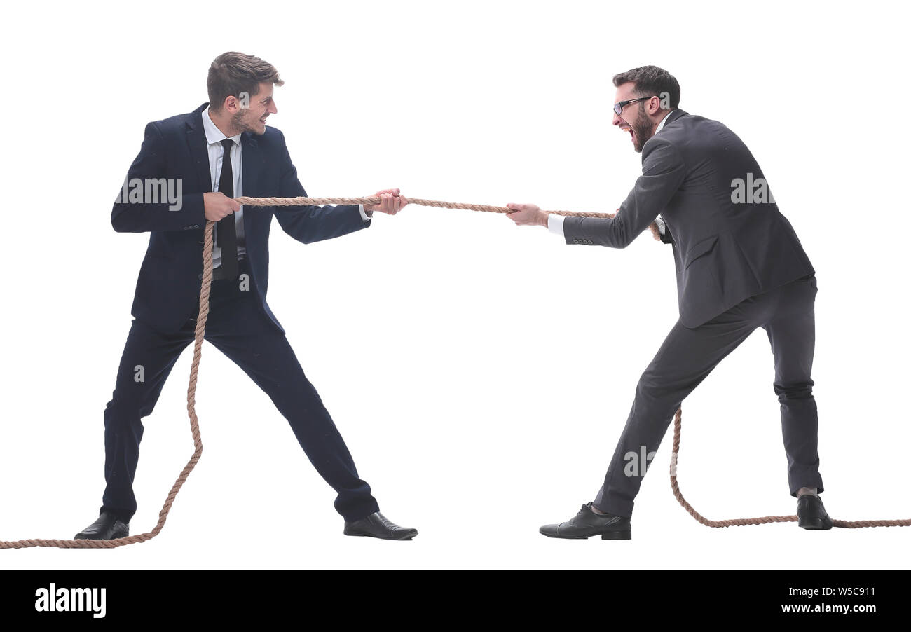 full length . two smiling businessmen pulling the rope Stock Photo - Alamy