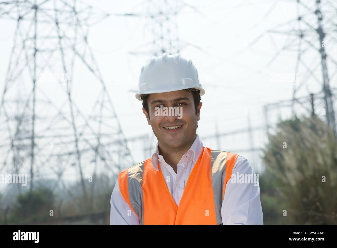 Portrait of an Indian engineer smiling Stock Photo - Alamy