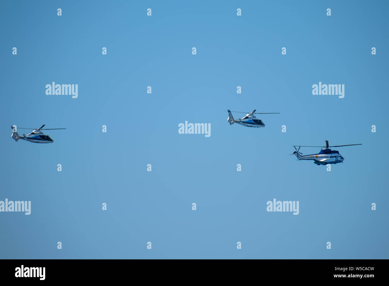 Police helicopters flying on the blue sky - Bucharest, Romania Stock ...