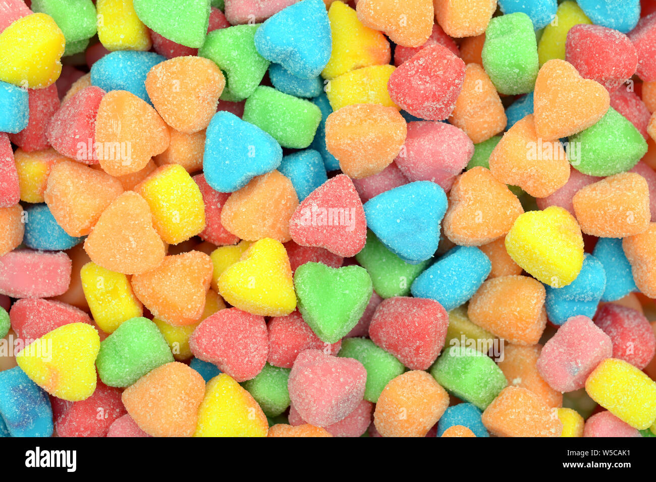 a lot of heart shape candies for background uses Stock Photo - Alamy
