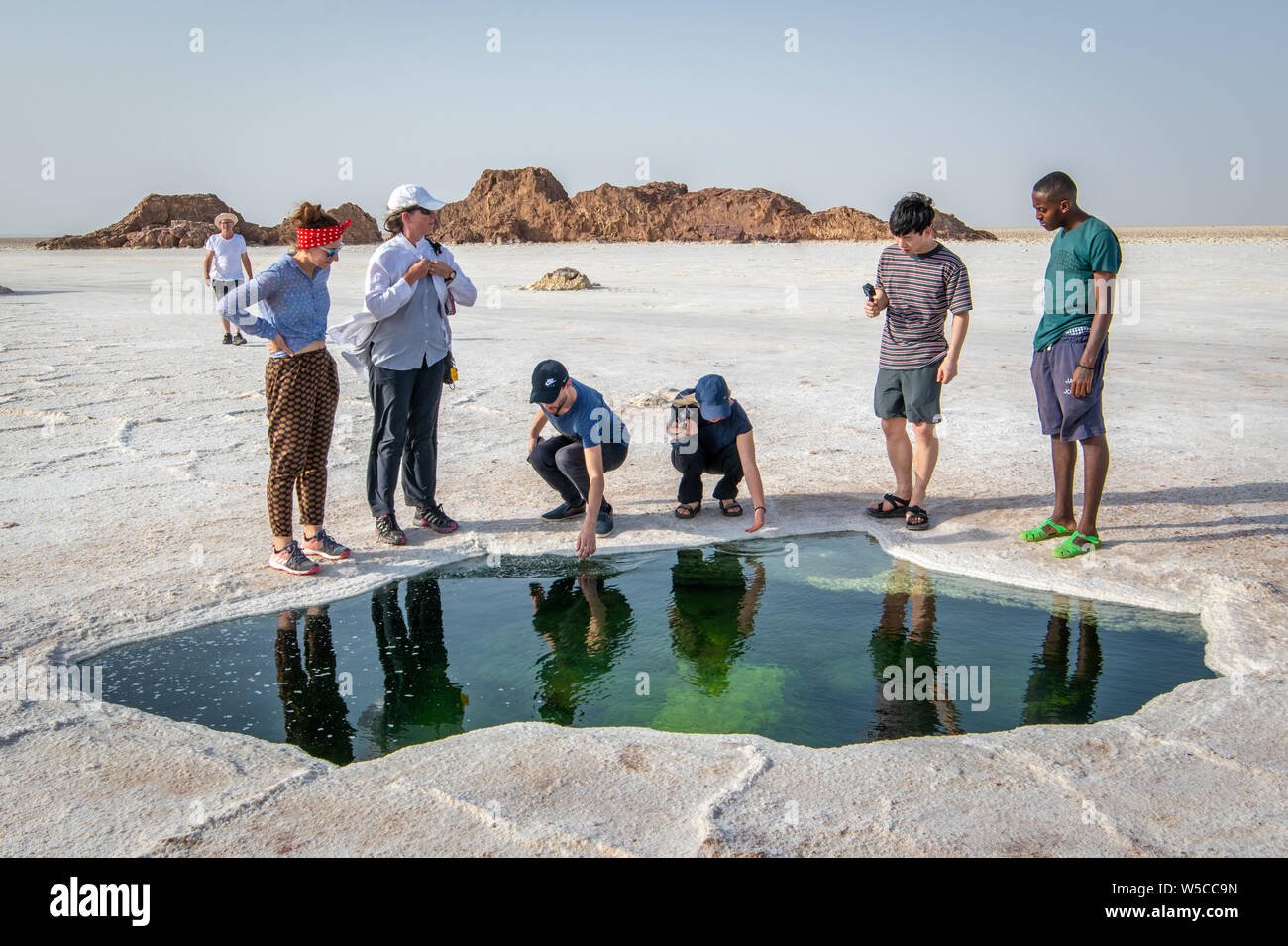 Water of Lake Karum, visible through a hole in the salt flat, Danakil ...