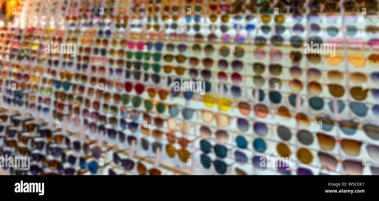 Sun glasses in the shop window. Soft focus background Stock Photo - Alamy