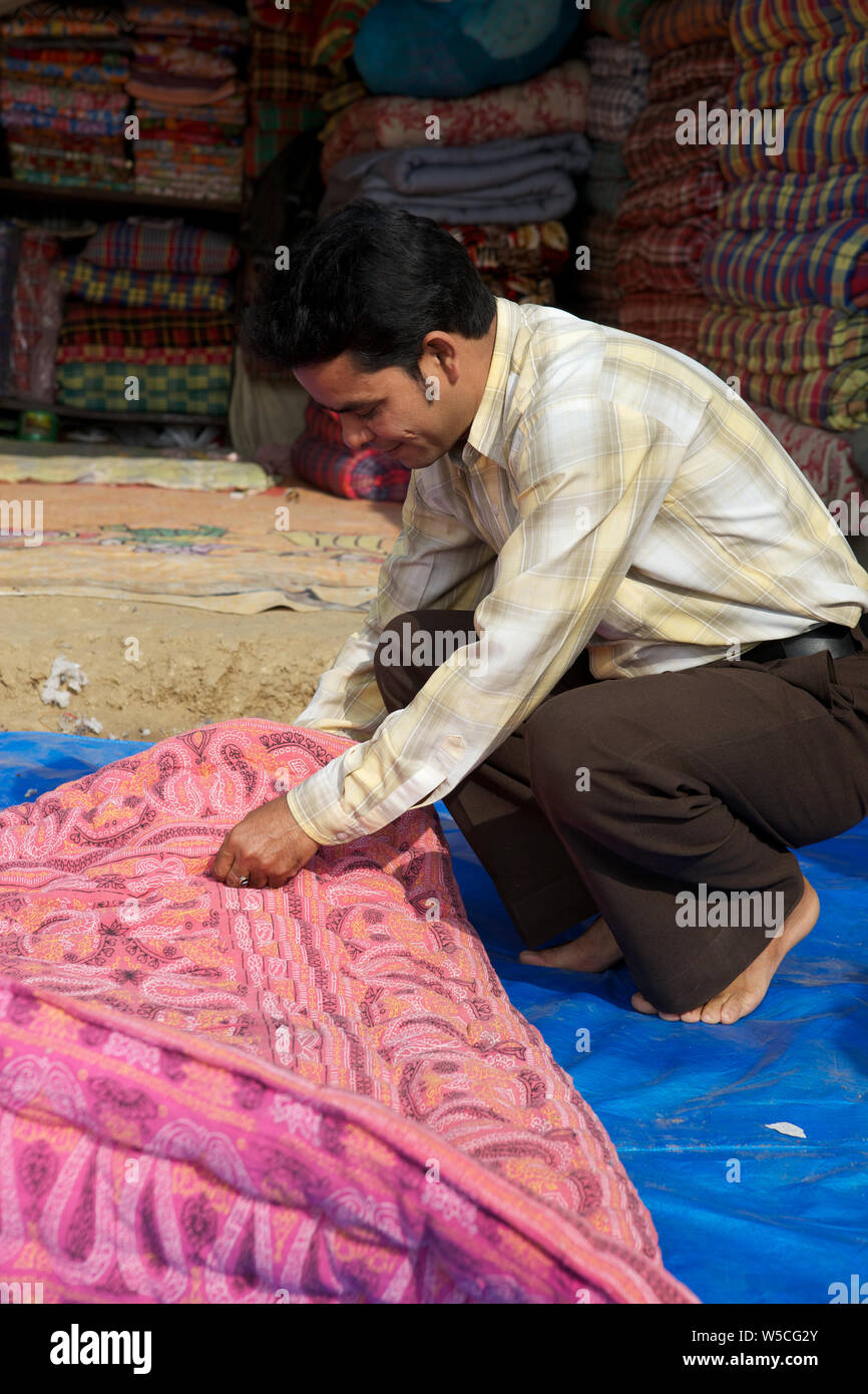 Man quilting in shop Stock Photo - Alamy
