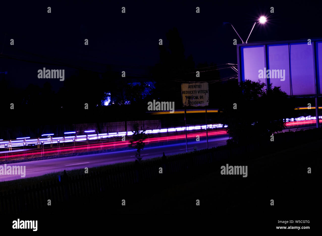 Long exposure photo of a street in Romania - Speed traffic, modern life ...