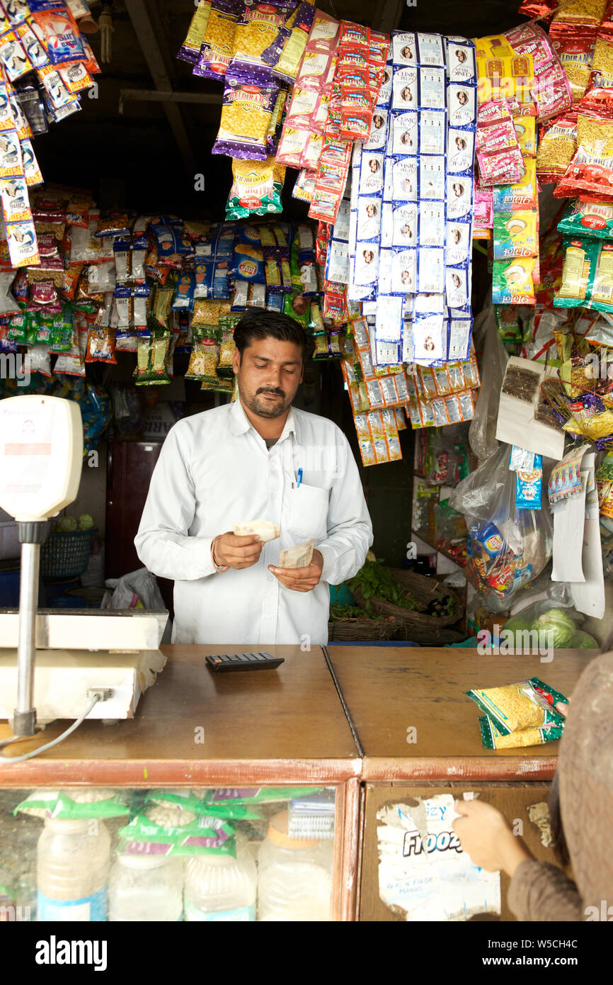 Indian shopkeeper casual clothing hi-res stock photography and images ...