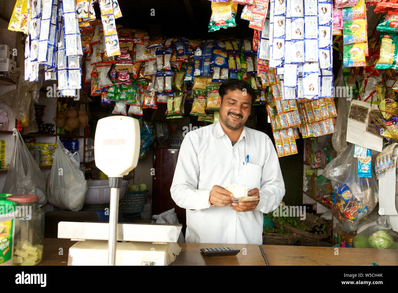 Indian shopkeeper casual clothing hi-res stock photography and images ...
