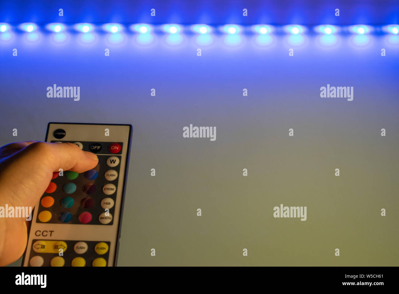 RGB led remote controller pointing to the led strip Stock Photo - Alamy