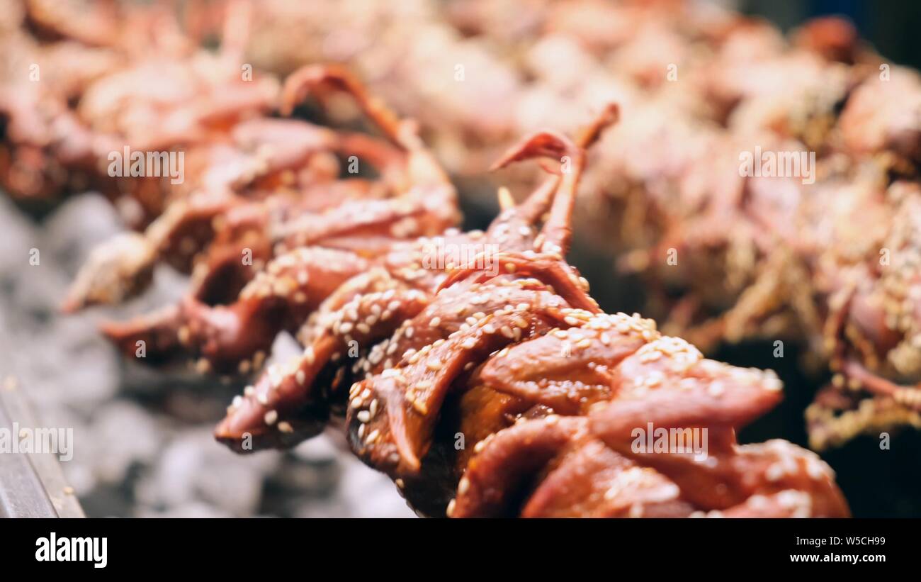duck roasting on a spit, Asian dish roast duck Stock Photo - Alamy