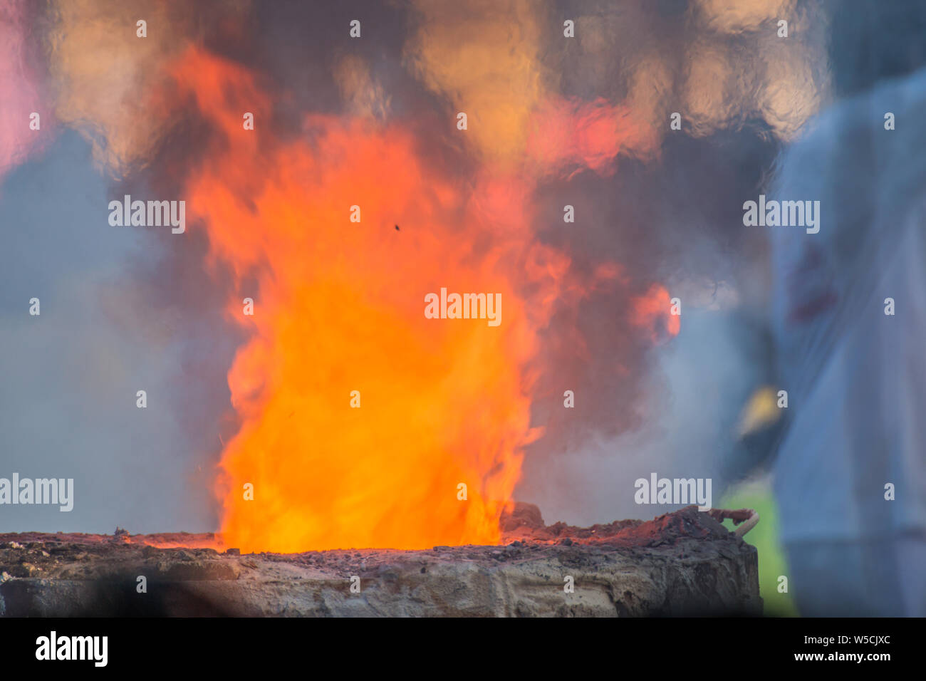 flame during the molten metal, Casting Stock Photo - Alamy