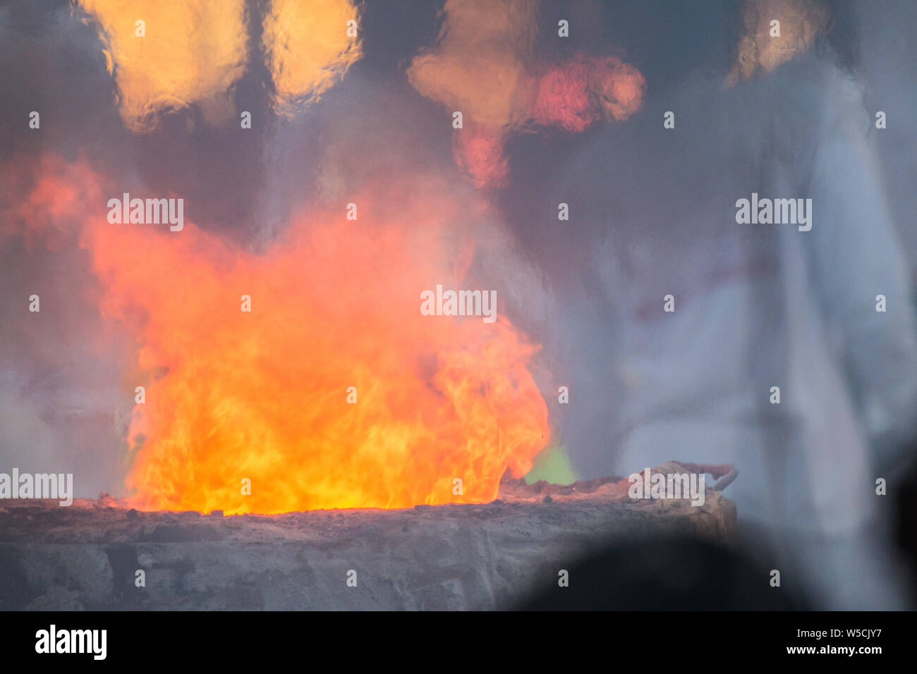flame during the molten metal, Casting Stock Photo - Alamy