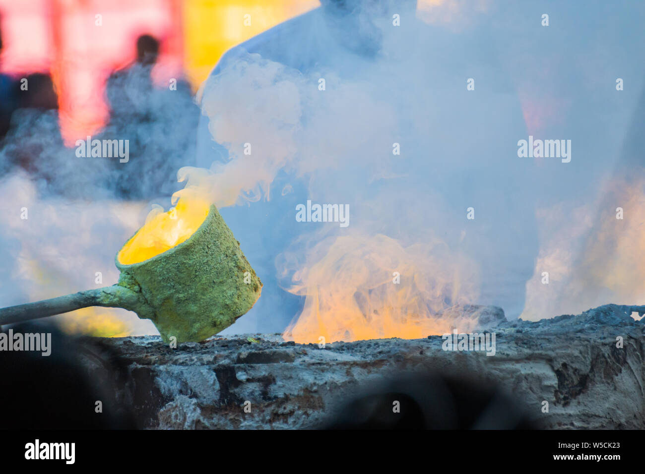 Molten metal being poured into moulds hi-res stock photography and ...
