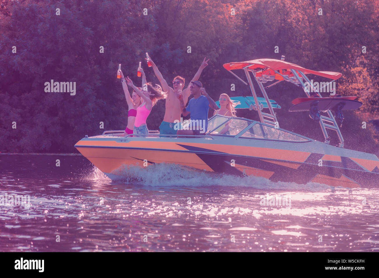 Group of young active people smiling and dancing Stock Photo - Alamy