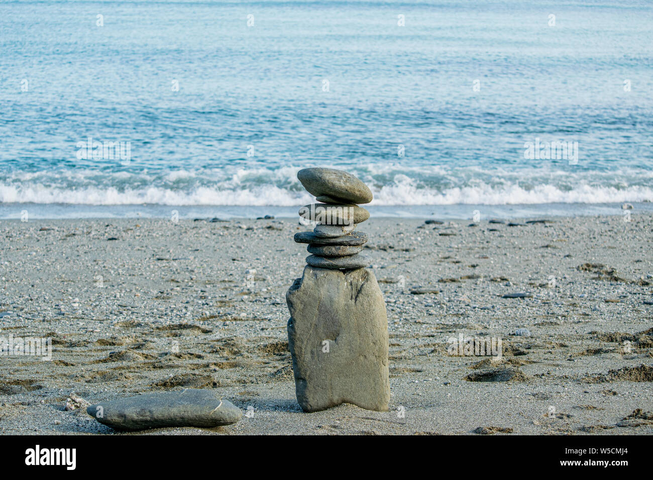 zen balancing rocks on beach Stock Photo - Alamy