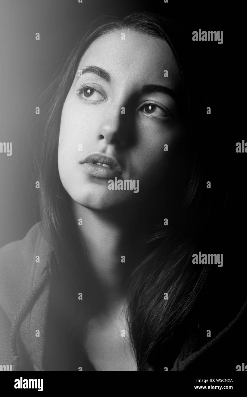 beautiful sad pensive sensual young woman on black background looking ...