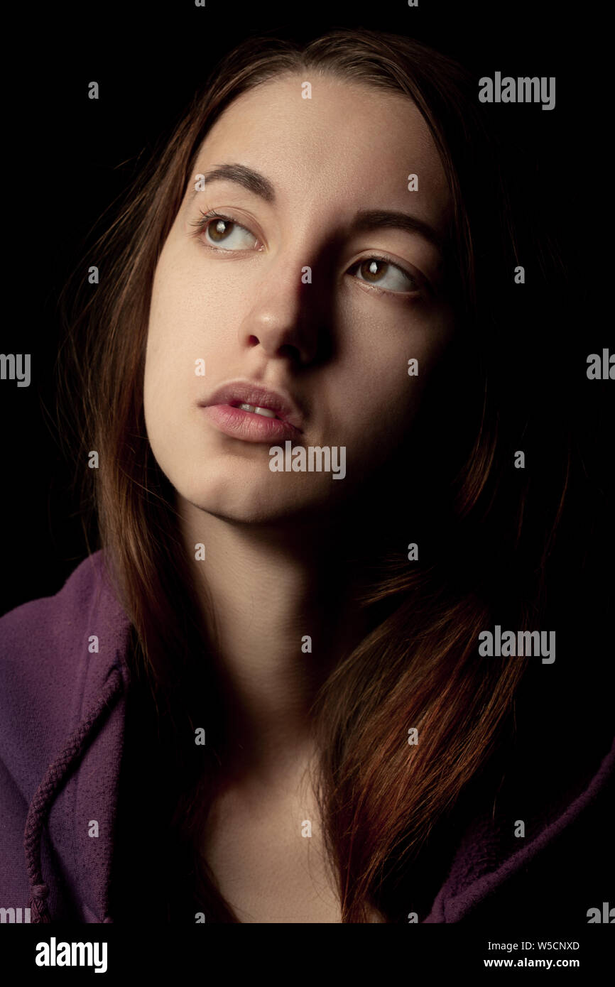 beautiful sad pensive sensual young woman on black background looking ...