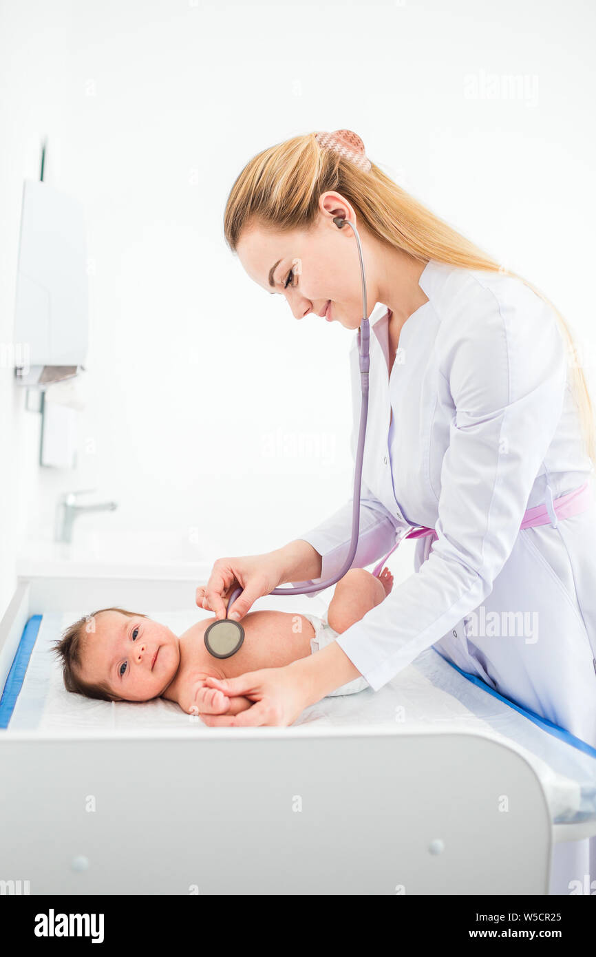 Girl using stethoscope listen chest hi-res stock photography and images ...