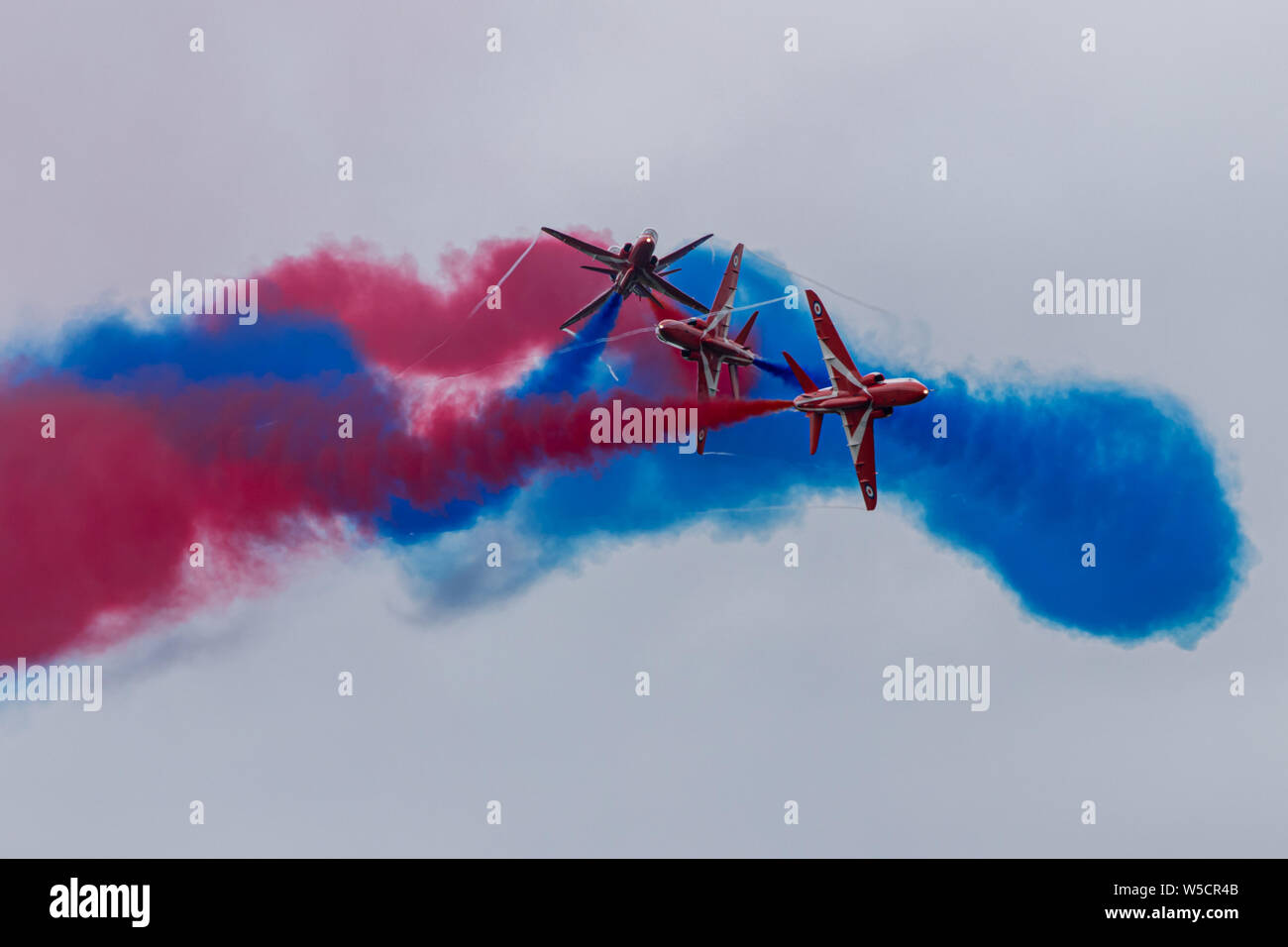 The Red Arrows completing one of there split manouvers Stock Photo - Alamy