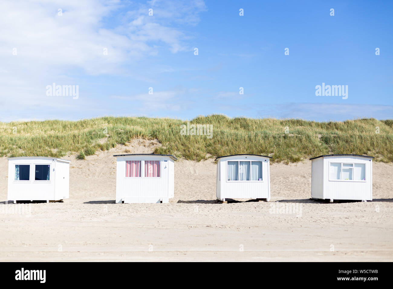 White Beach Cabins at Lokken Beach Stock Photo - Alamy
