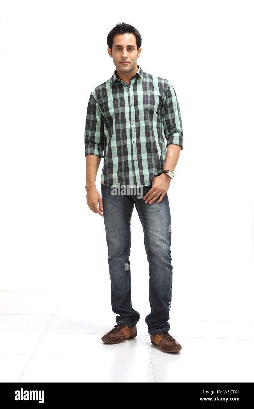 Handsome indian man in black Cut Out Stock Images & Pictures - Alamy