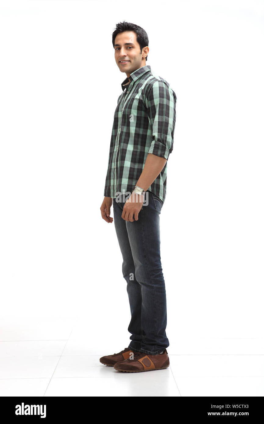 Side profile of a man standing Stock Photo - Alamy