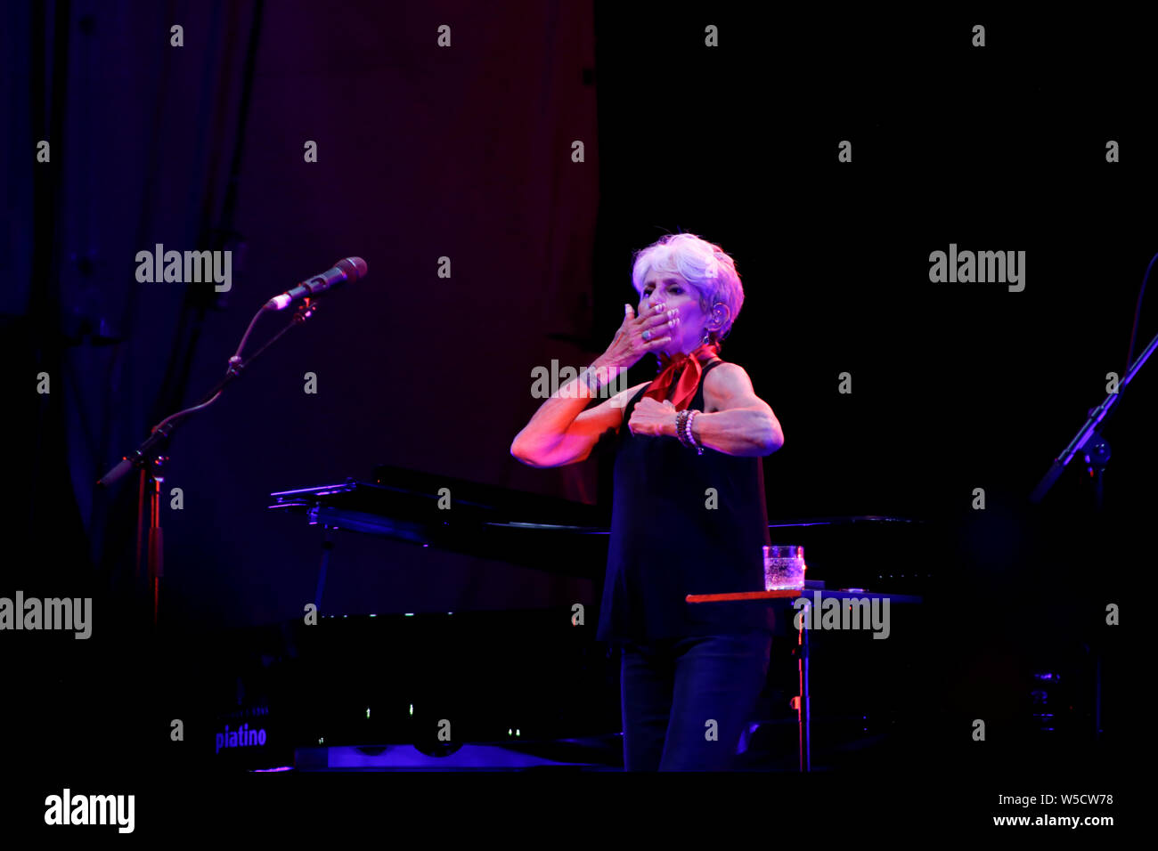 Joan Baez singing and playing in her last concert of her career at ...