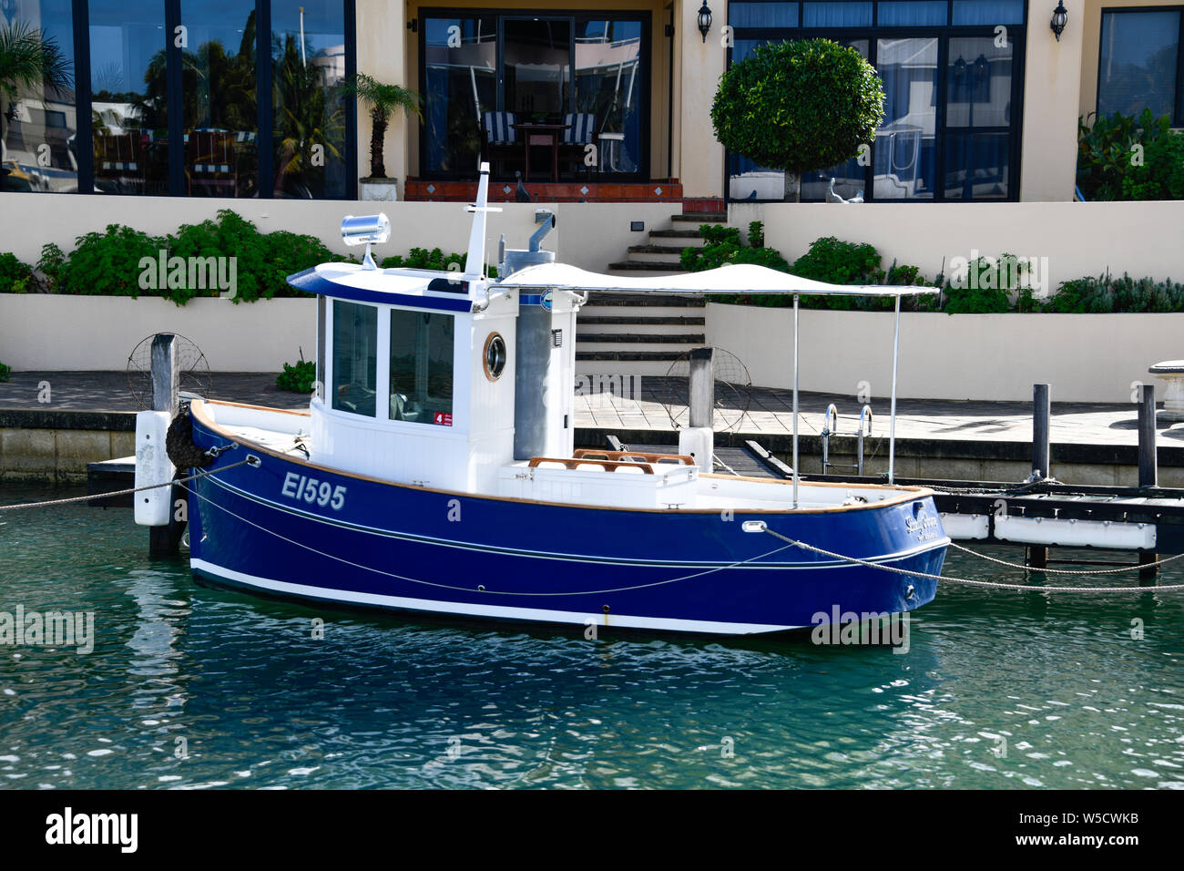 Small Pleasure Craft Blue Tugboat in Mandurah Western Australia Stock ...
