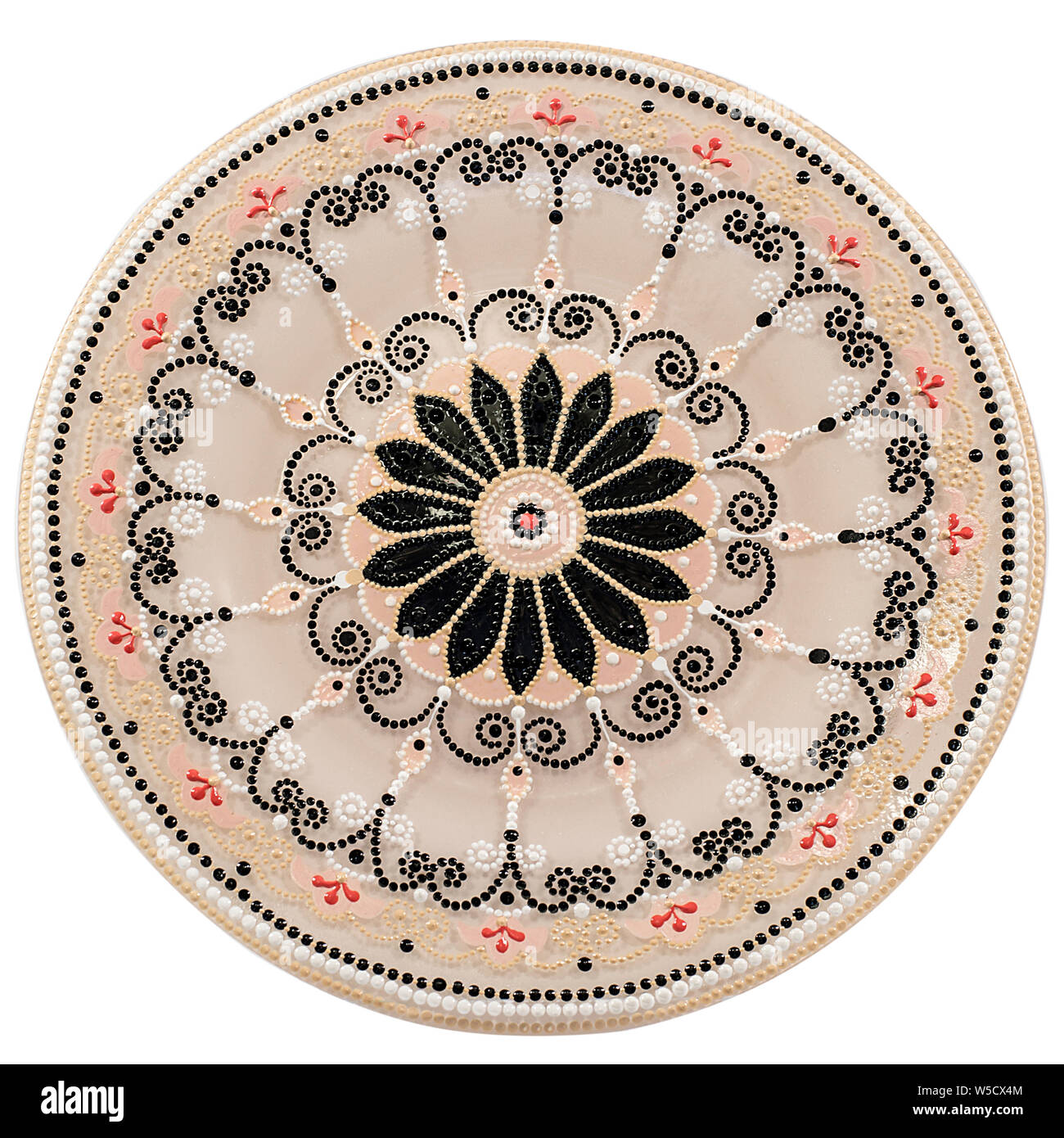 Decorative ceramic dish painted with a circular pattern, isolated on a ... Decorative ceramic dish painted with a circular pattern, isolated on a ...