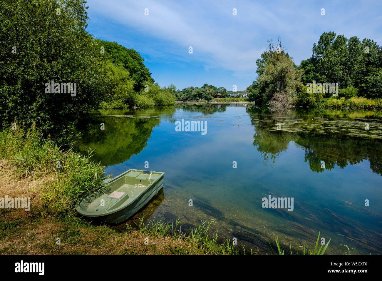 The River Eure, a tributary of the Seine, in Pont-de-l'Arche, Normandy ...